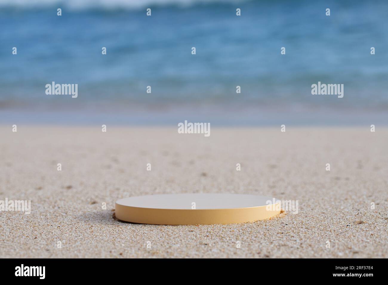 Beige platform on the beach for standing product against the ocean ...