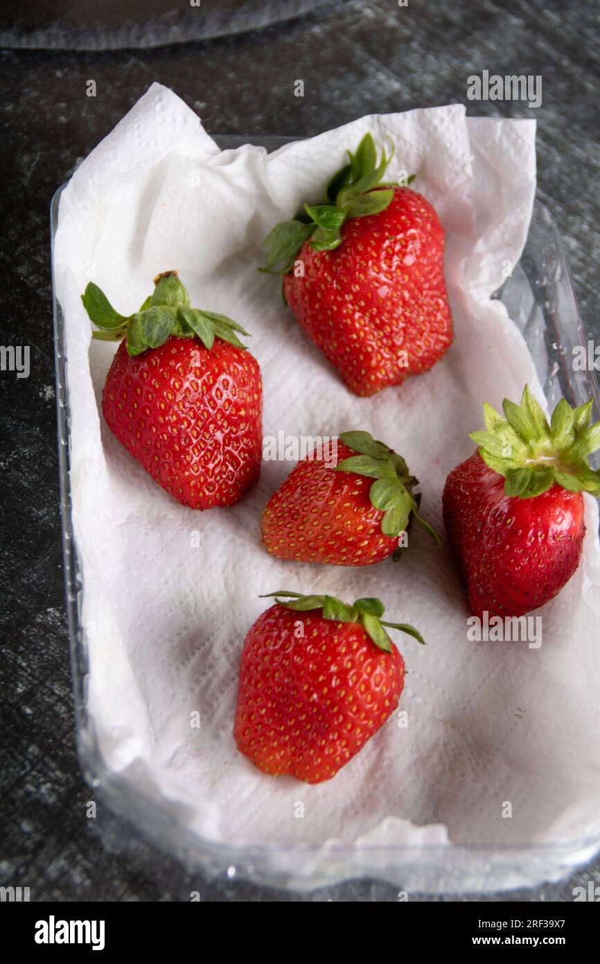 Strawberries a plastic box hi-res stock photography and images - Alamy