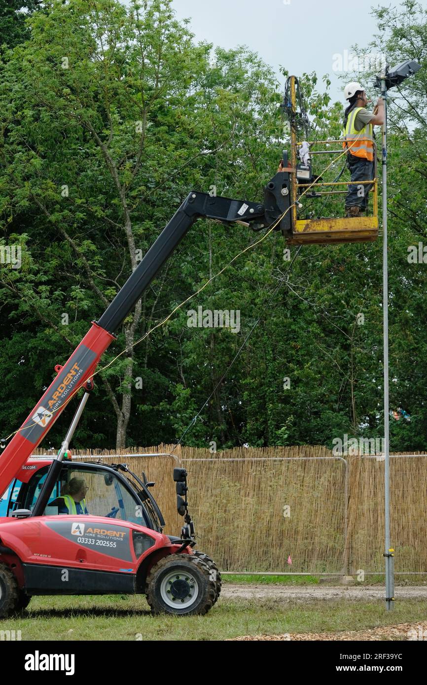 Lighting being installed at a festival Stock Photo - Alamy