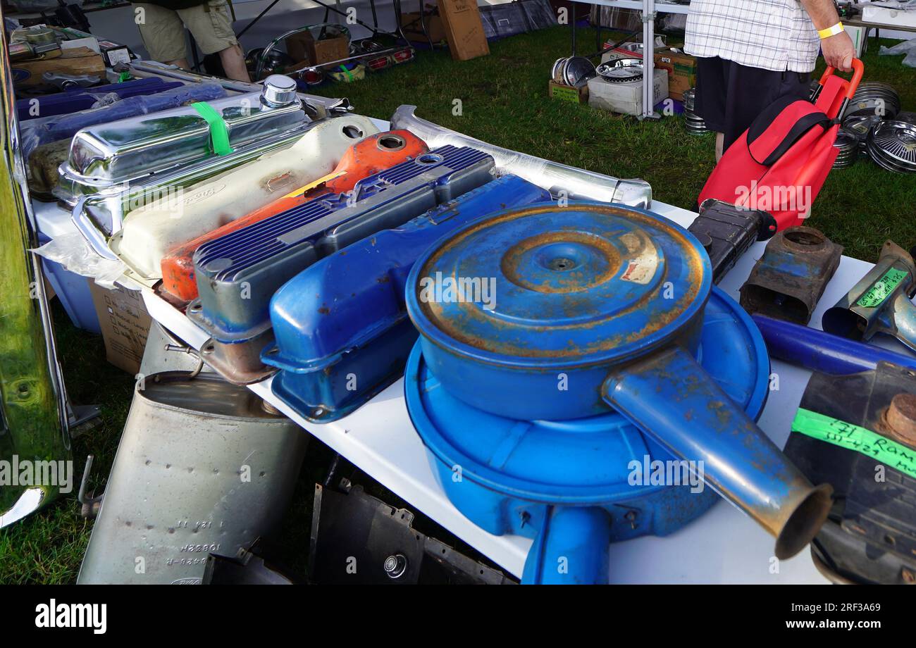 Antique car parts at a car show flea market Stock Photo - Alamy