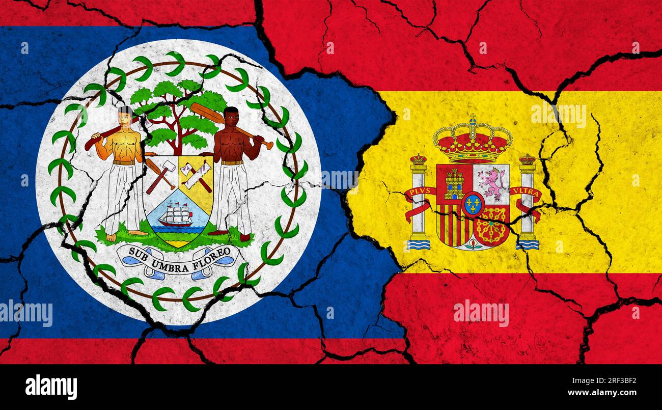 Flags of Belize and Spain on cracked surface - politics, relationship ...