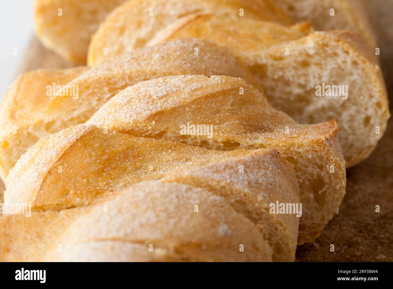 cut white bread into pieces to use for sandwiches Stock Photo - Alamy