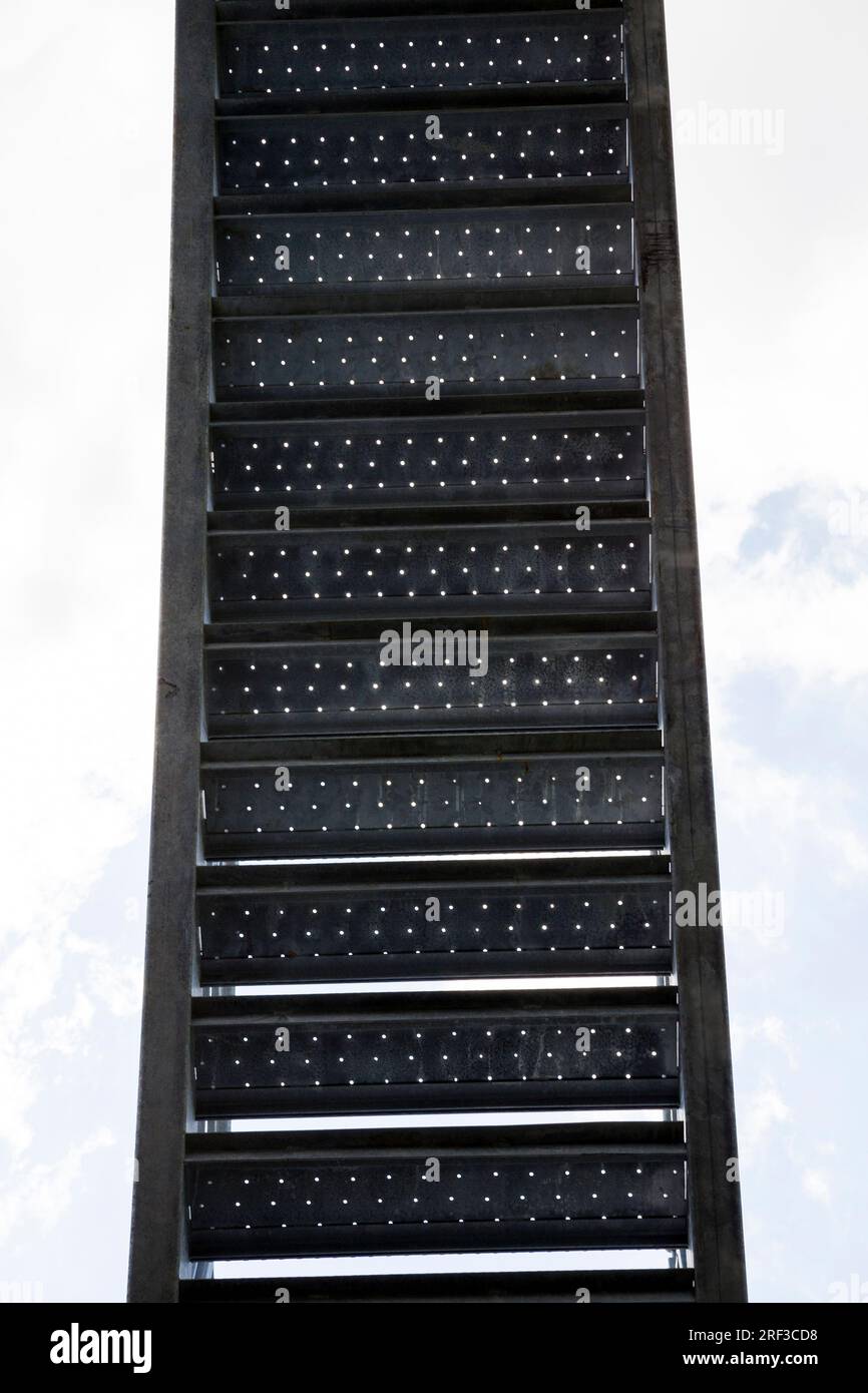 steel metal ladder made of strong metal and has an uneven structure of ...