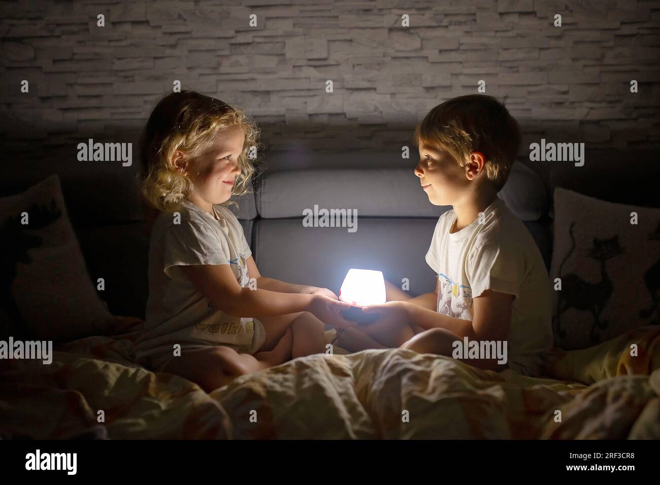 Boy reading under cover hi-res stock photography and images - Alamy