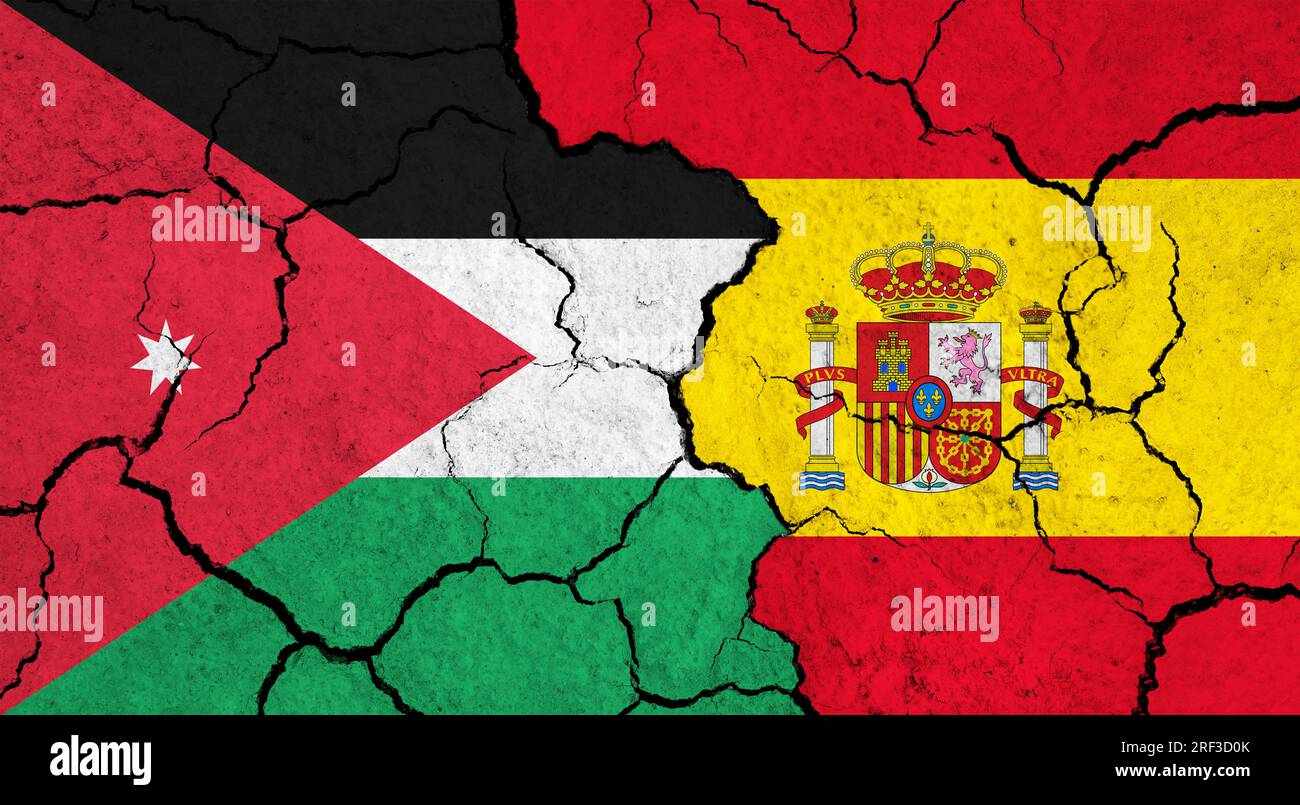 Flags of Jordan and Spain on cracked surface - politics, relationship ...