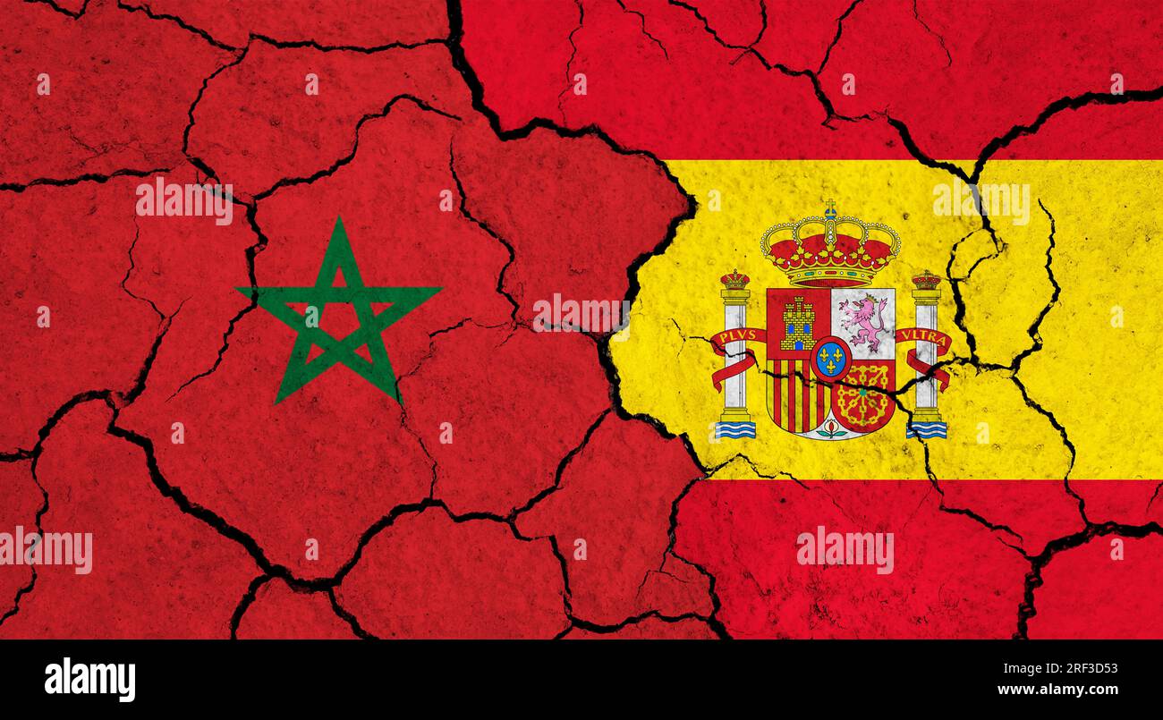 Flags of Morocco and Spain on cracked surface - politics, relationship ...