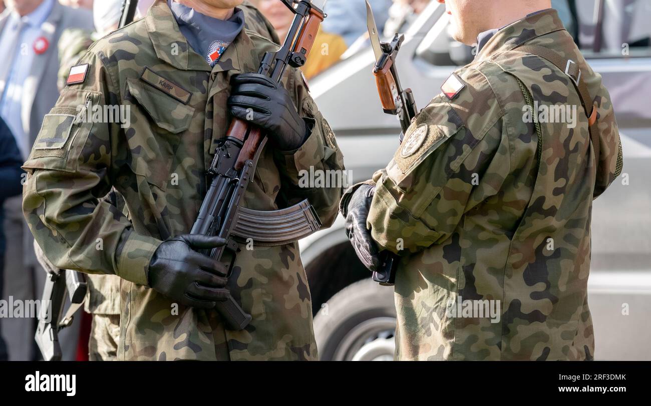 Krakow, Poland, two professional Polish soldiers standing on the street ...