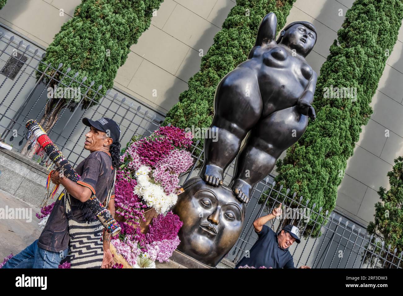 Medellin, Colombia. 29th July, 2023. People walk past artwork by ...