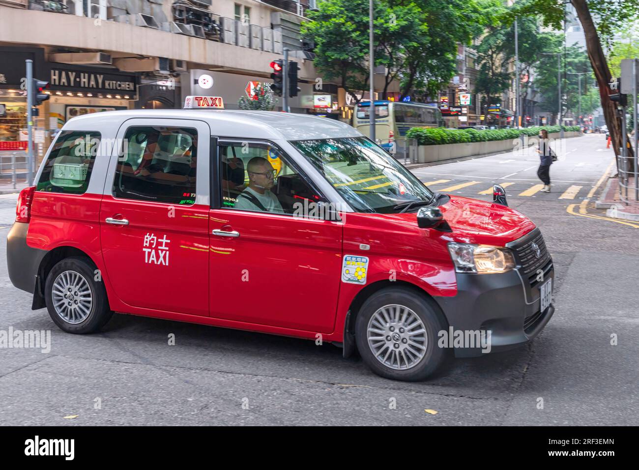 Toyota Comfort Hybrid Taxi in motion, Wanchai, Hong Kong, SAR, China ...