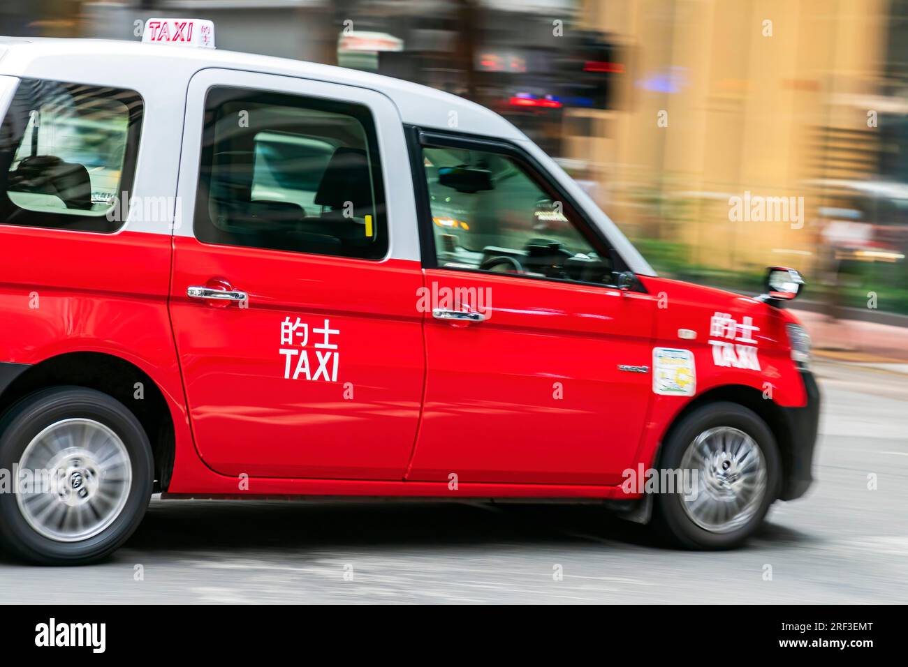 Toyota Comfort Hybrid Taxi in motion, Wanchai, Hong Kong, SAR, China ...