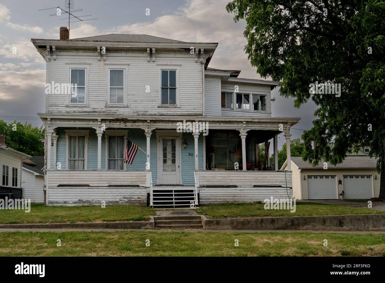 abandoned historical house with American flag Stock Photo - Alamy
