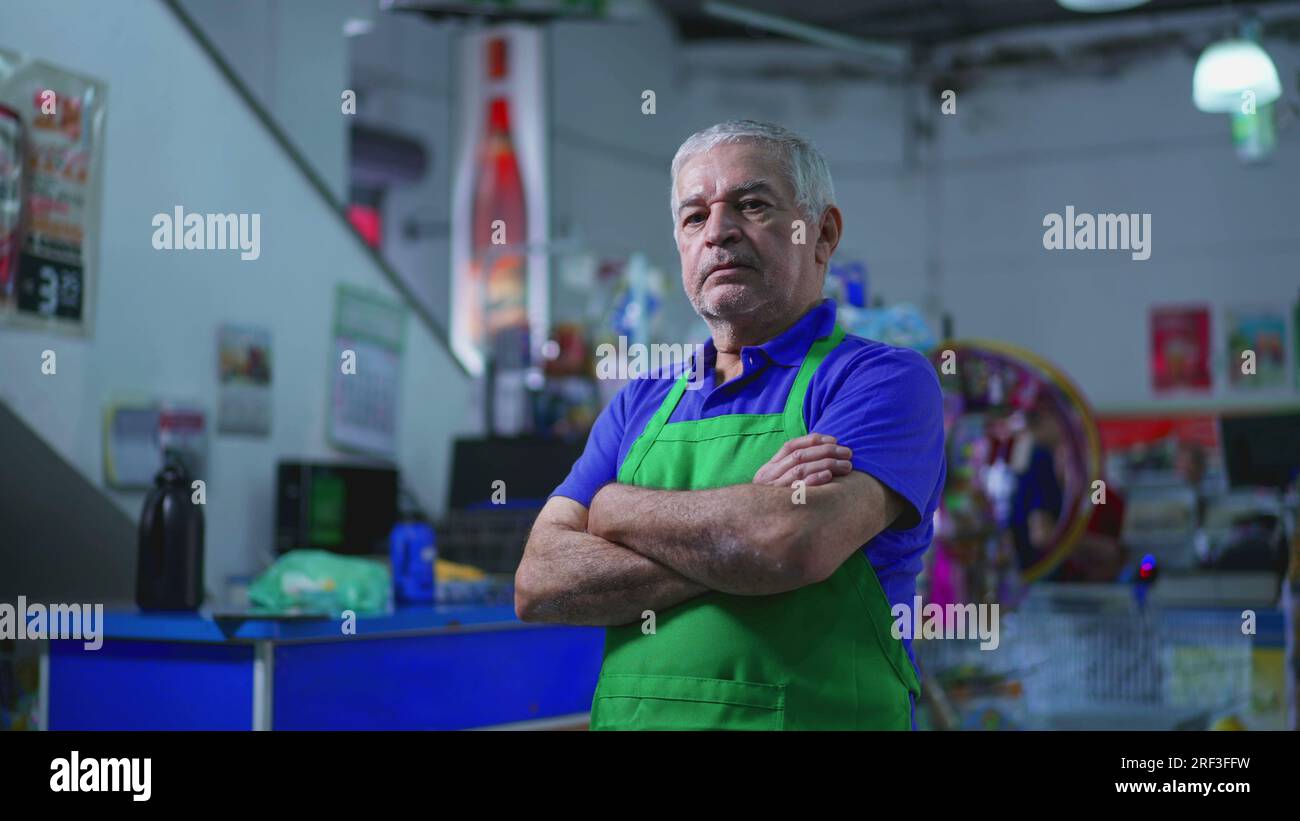 Serious Supermarket Manager with Arms Crossed, Concerned Expression of ...