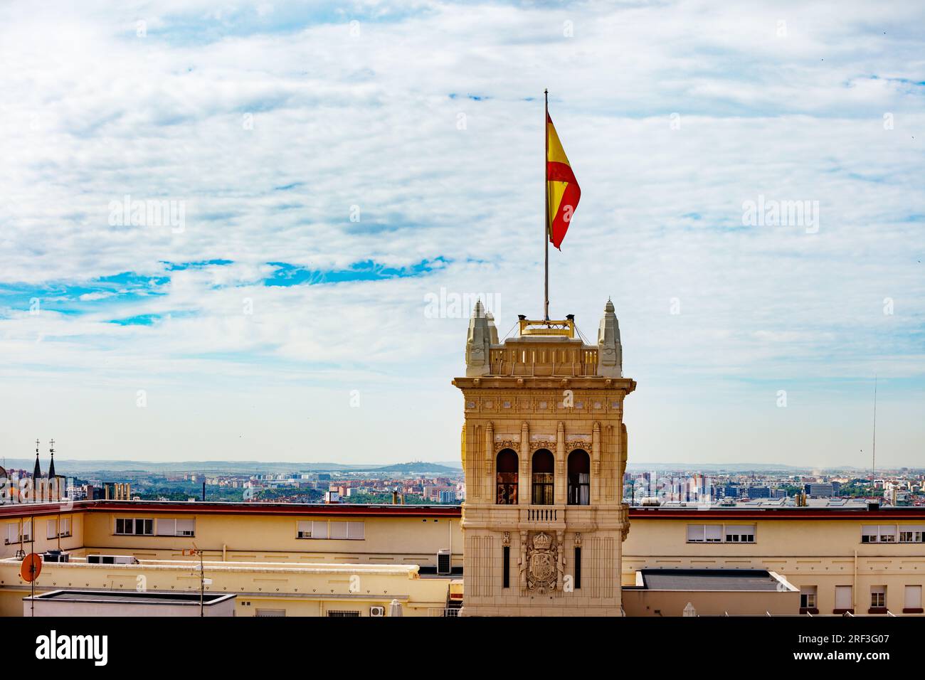Spain flag on navy headquarters in Madrid over cityscape view Stock ...