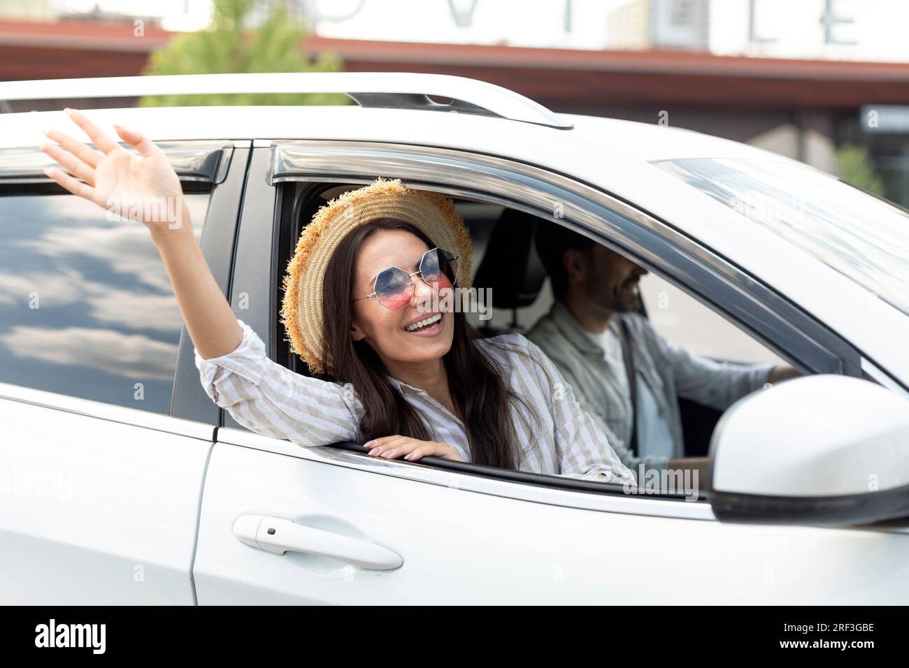 Family waving from window hi-res stock photography and images - Alamy