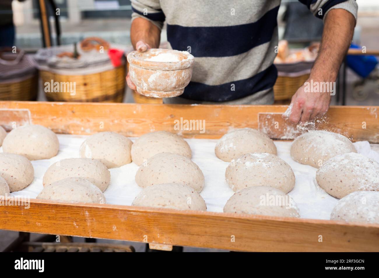 Bread preparation. loaves of dough before baking Stock Photo - Alamy