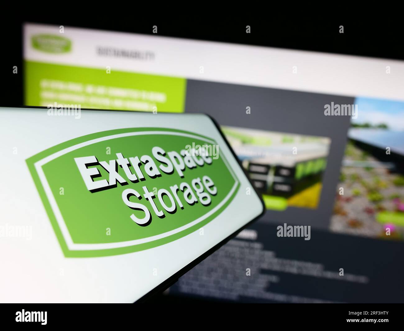 Mobile phone with logo of American company Extra Space Storage Inc. on ...