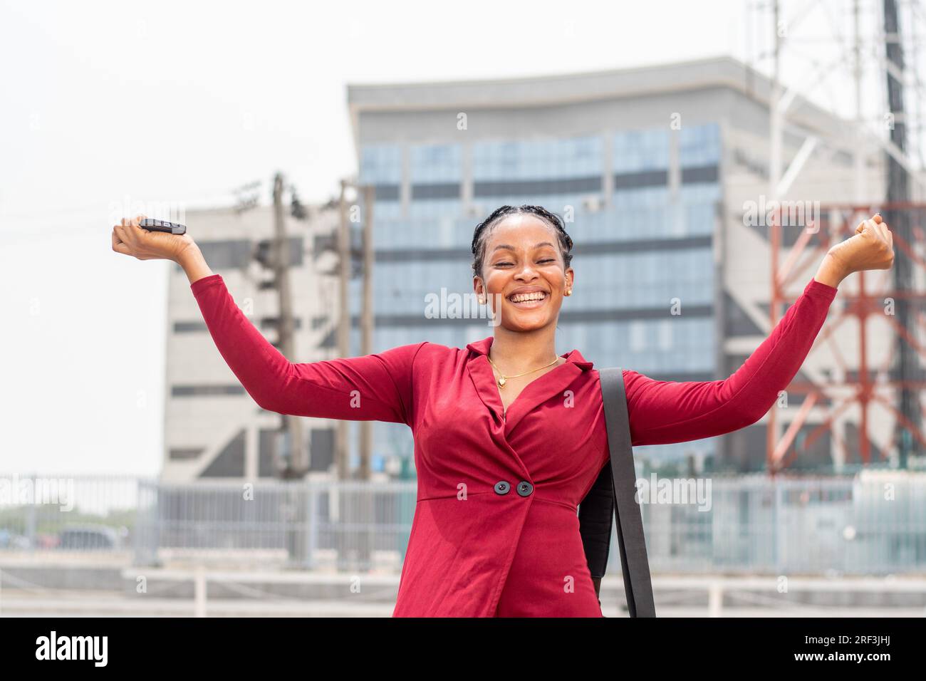 beautiful young african lady feeling happy and celebrates Stock Photo ...