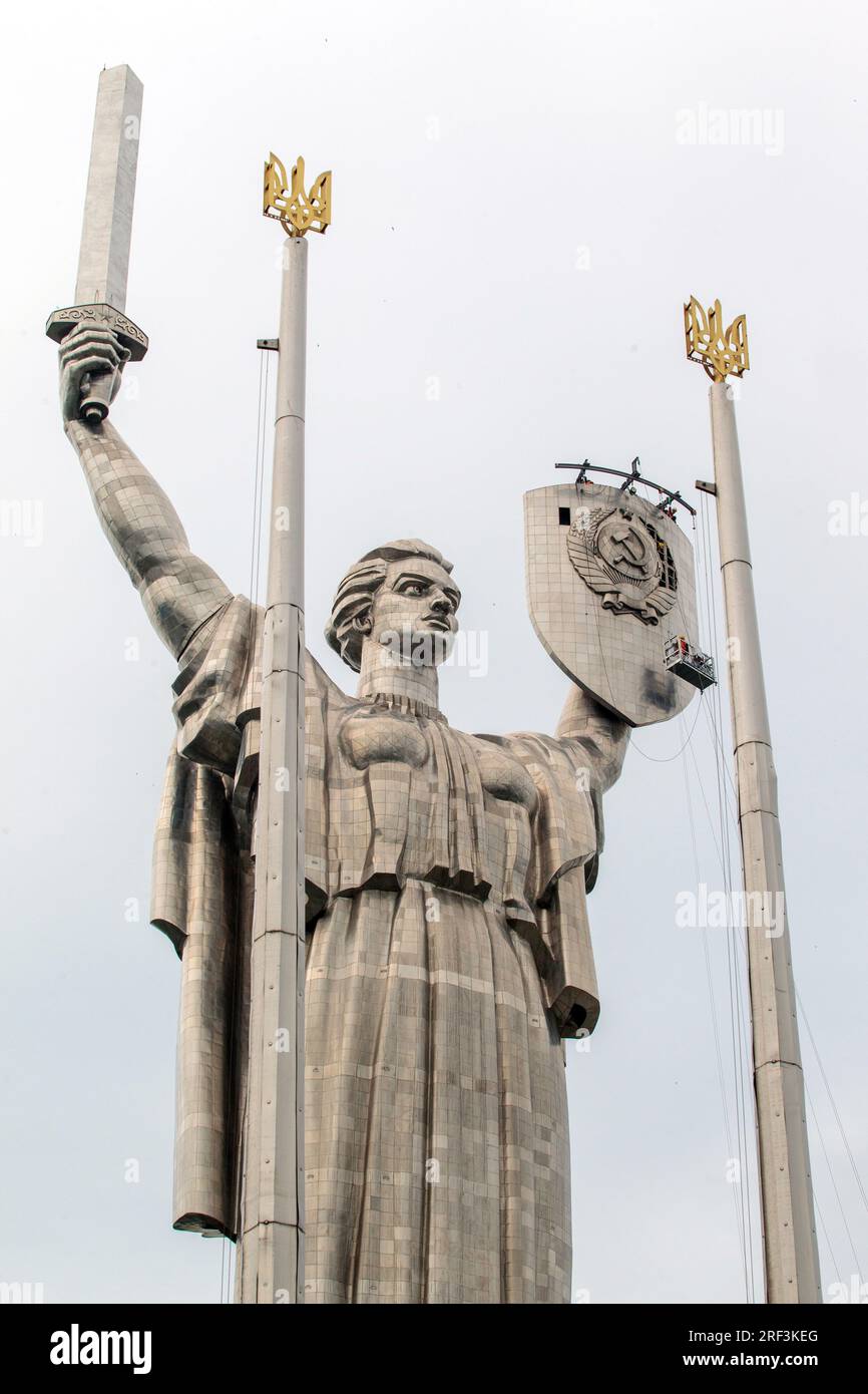 KYIV, UKRAINE - JULY 31, 2023 - Two flagpoles crowned by the coat of ...