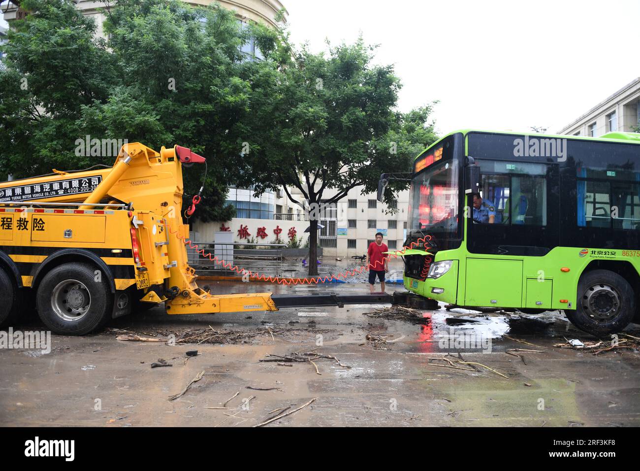 Beijing, China. 31st July, 2023. Rescuers handle a bus breakdown in ...