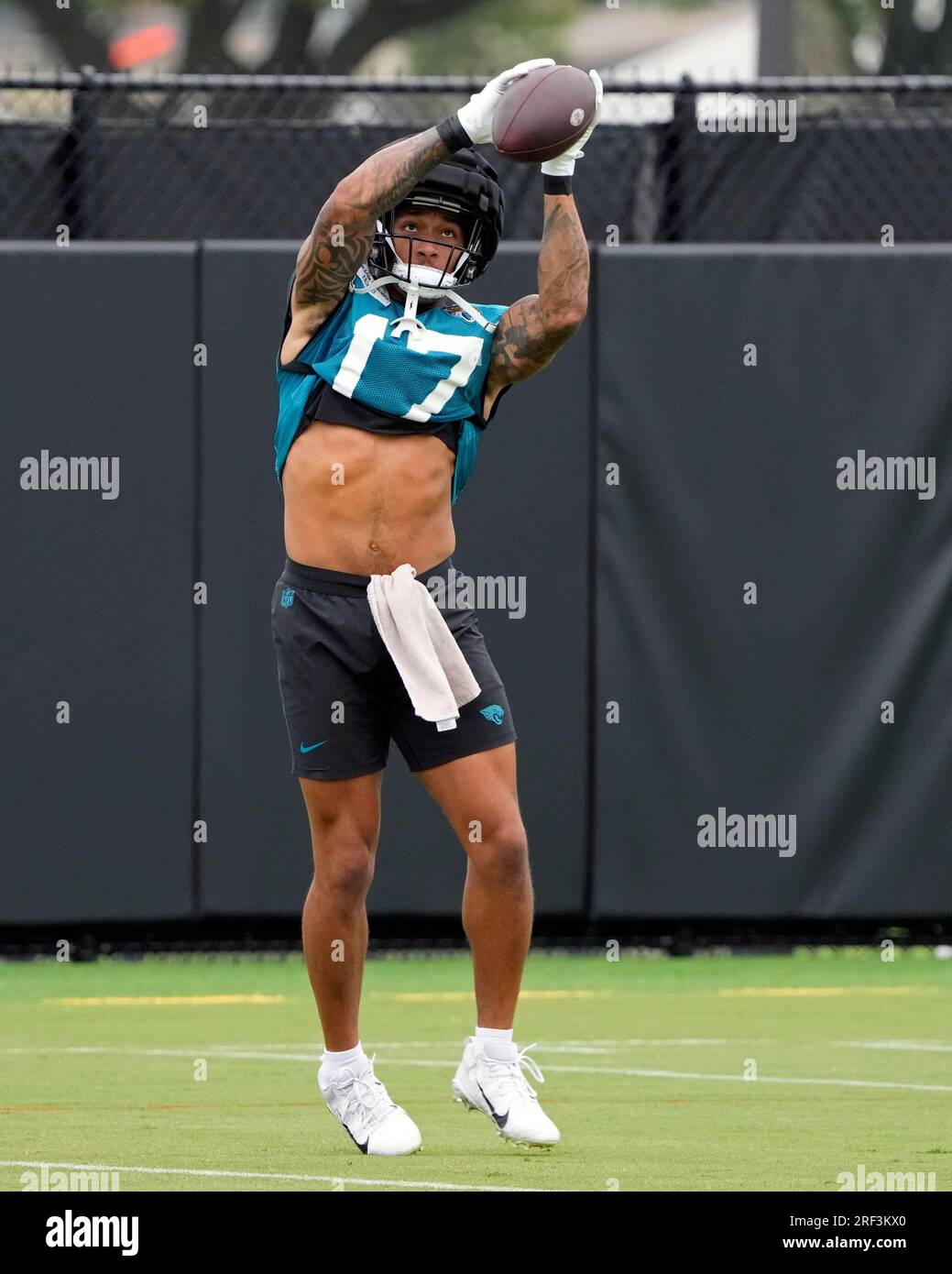 Jacksonville Jaguars tight end Evan Engram (17) makes a catch during a passing drill in practice ...
