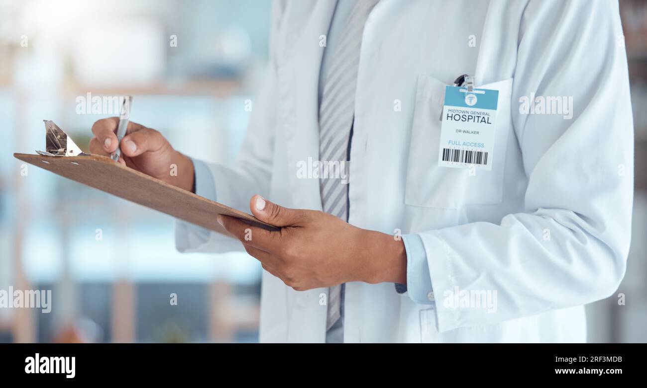 Person hands, doctor and clipboard writing for hospital schedule ...