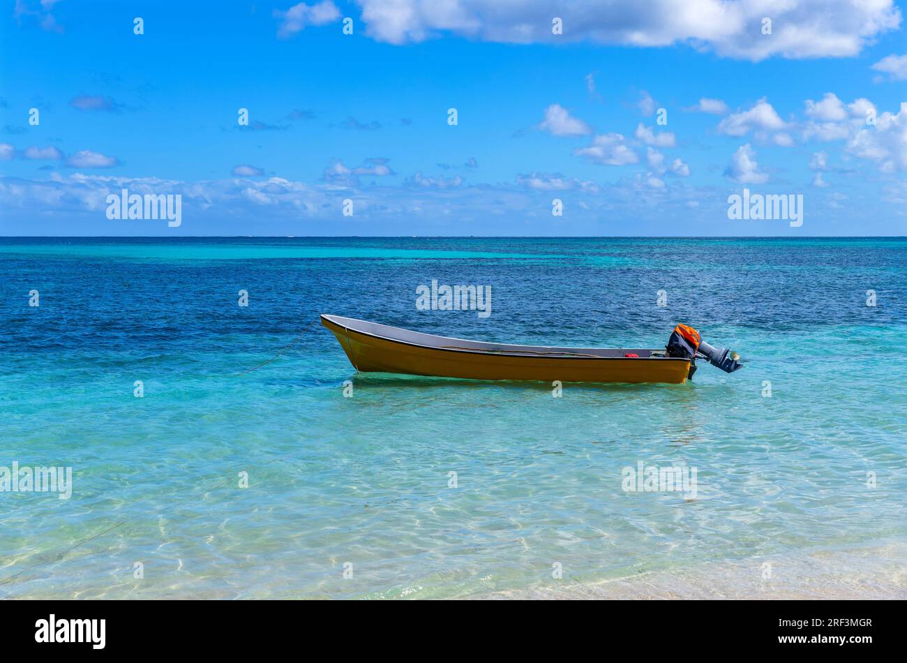 Boat in the stunning idyllic blue lagoon beach in the Yasawa island in ...