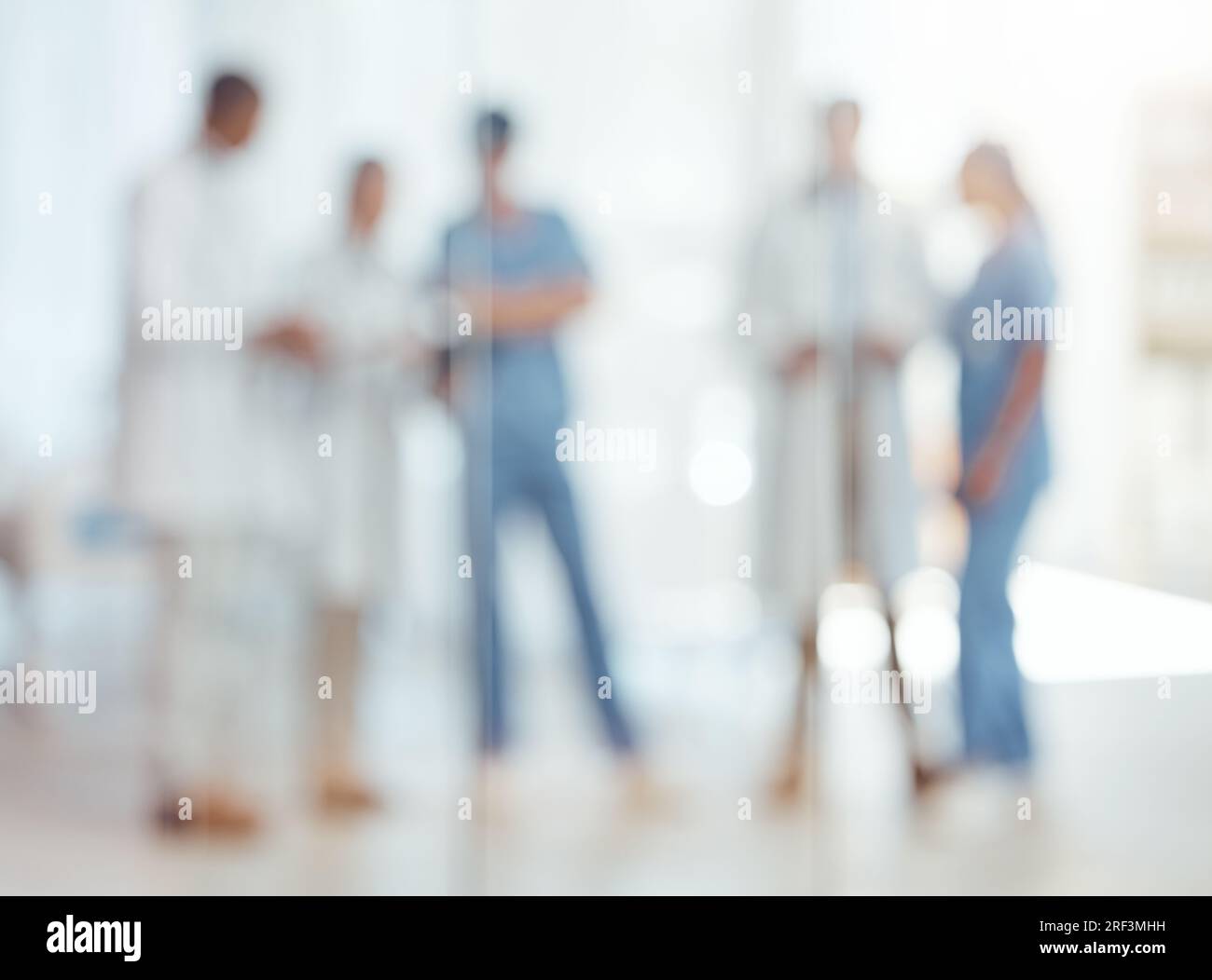Group of doctors, nurses and blurred hospital, meeting and planning ...