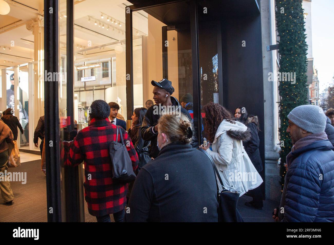 People enter Selfridges store on Oxford Street in London, at the ...