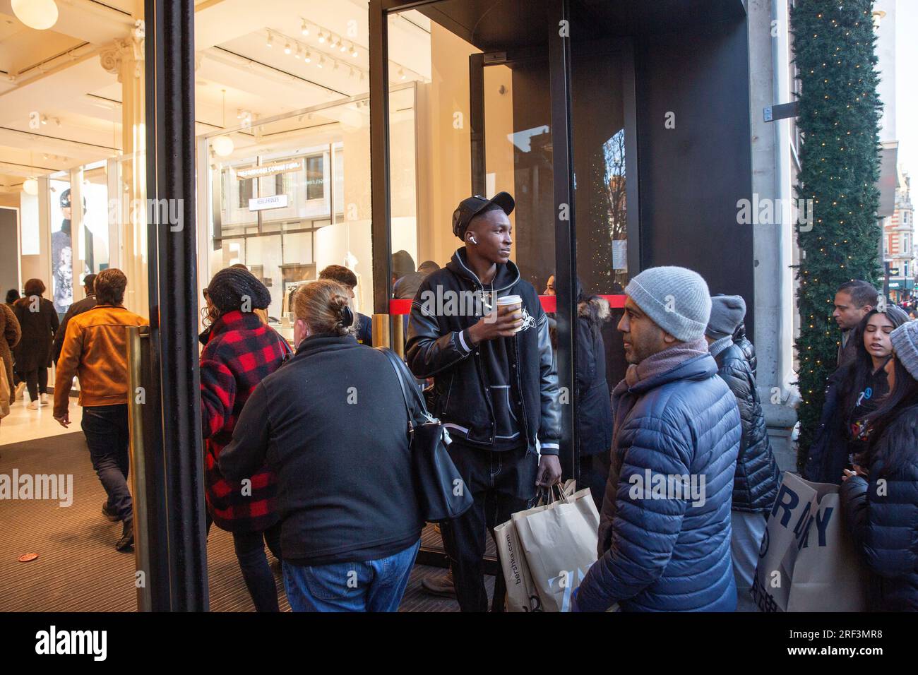 People enter Selfridges store on Oxford Street in London, at the ...