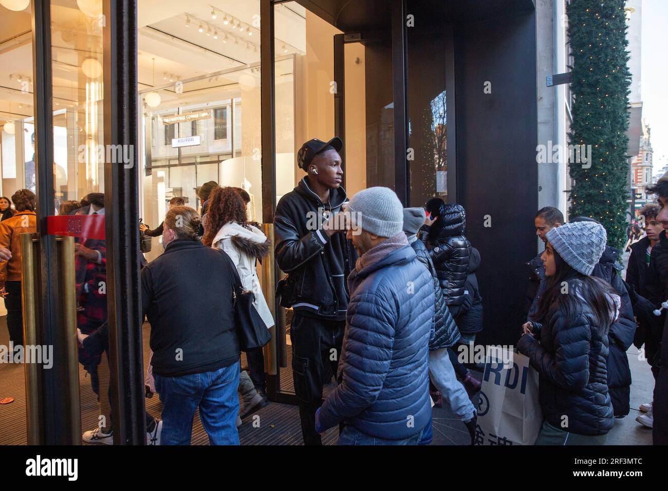 People enter Selfridges store on Oxford Street in London, at the ...