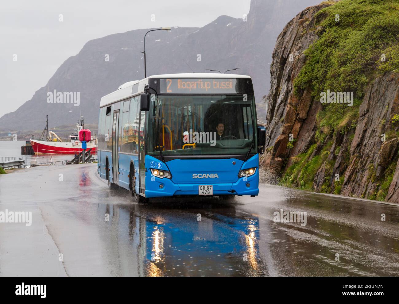 Illoqarfiup bus at Sisimiut, Greenland on a wet rainy day in July Stock ...