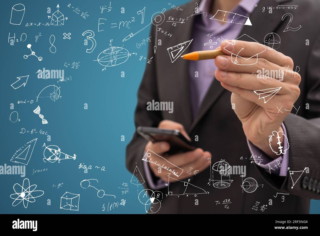 Man writing math formulas on the screen Stock Photo - Alamy
