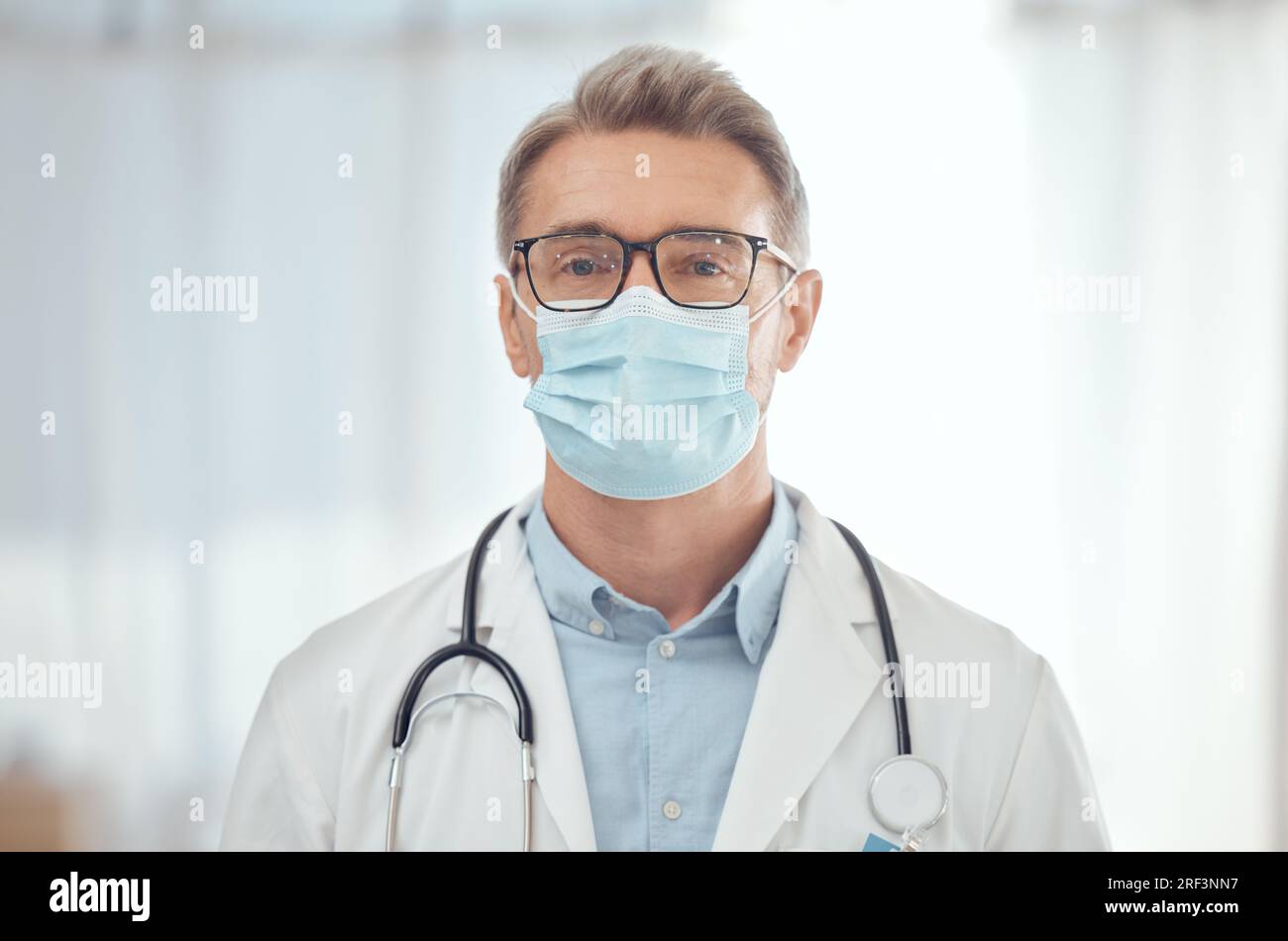 Man, portrait and doctor with face mask in hospital for medical ...