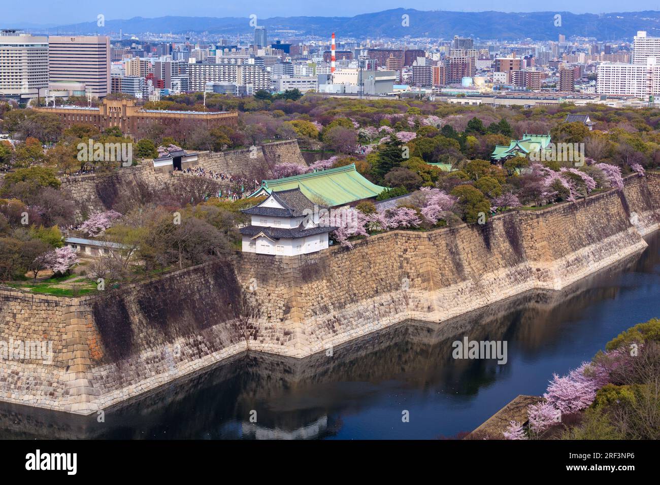 Aerial view of Osaka castle in cherry blossom season, Osaka, Japan ...