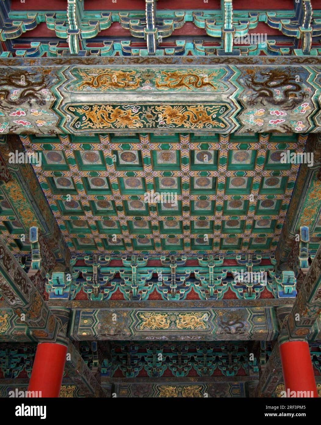 colorful decorated chinese ceiling in a traditional building of the ...