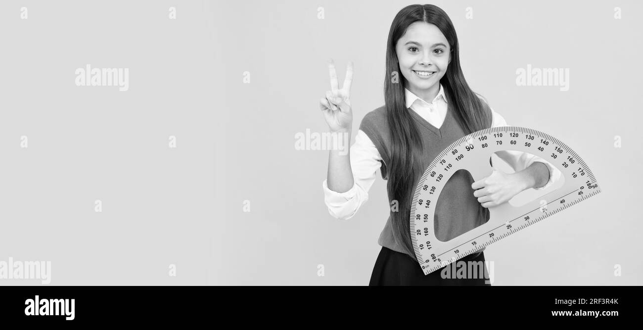 start the brain engine. angle degree measurement. happy teen girl hold ...