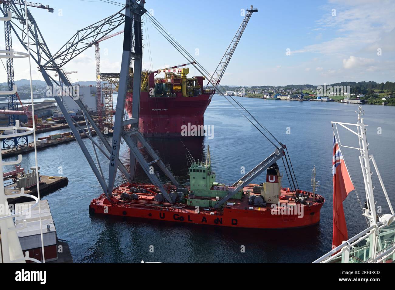 Norwegian crane ship Uglen and floating storage/production vessel ...