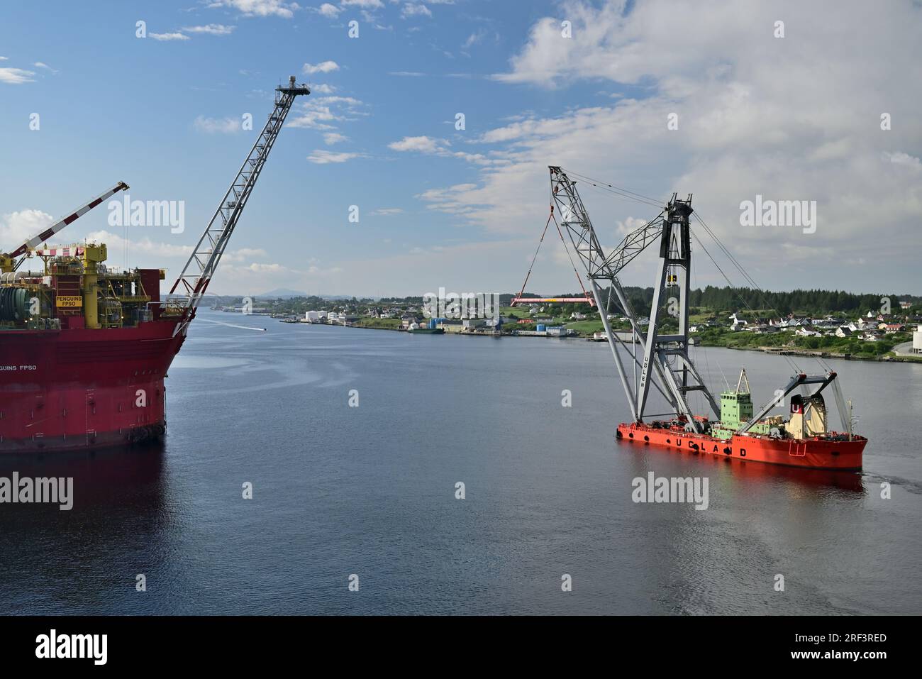 Norwegian crane ship Uglen and floating storage/production vessel ...
