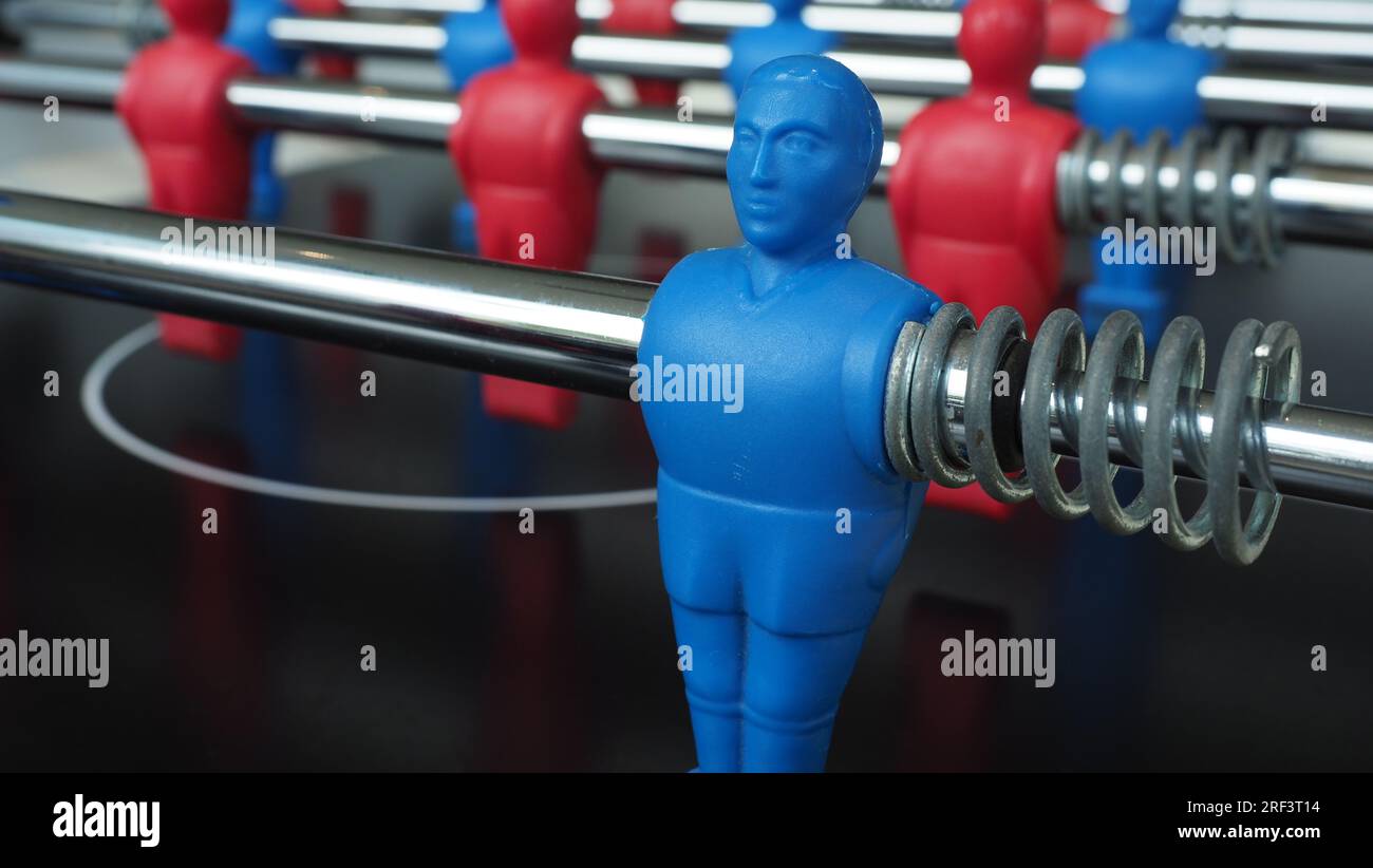 Football table or soccer table game with plastic player figurine. Mini ...