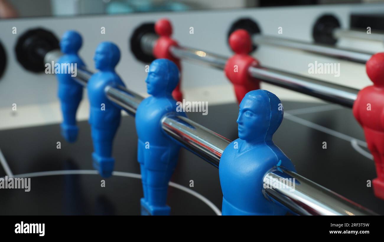 Football table or soccer table game with plastic player figurine. Mini ...