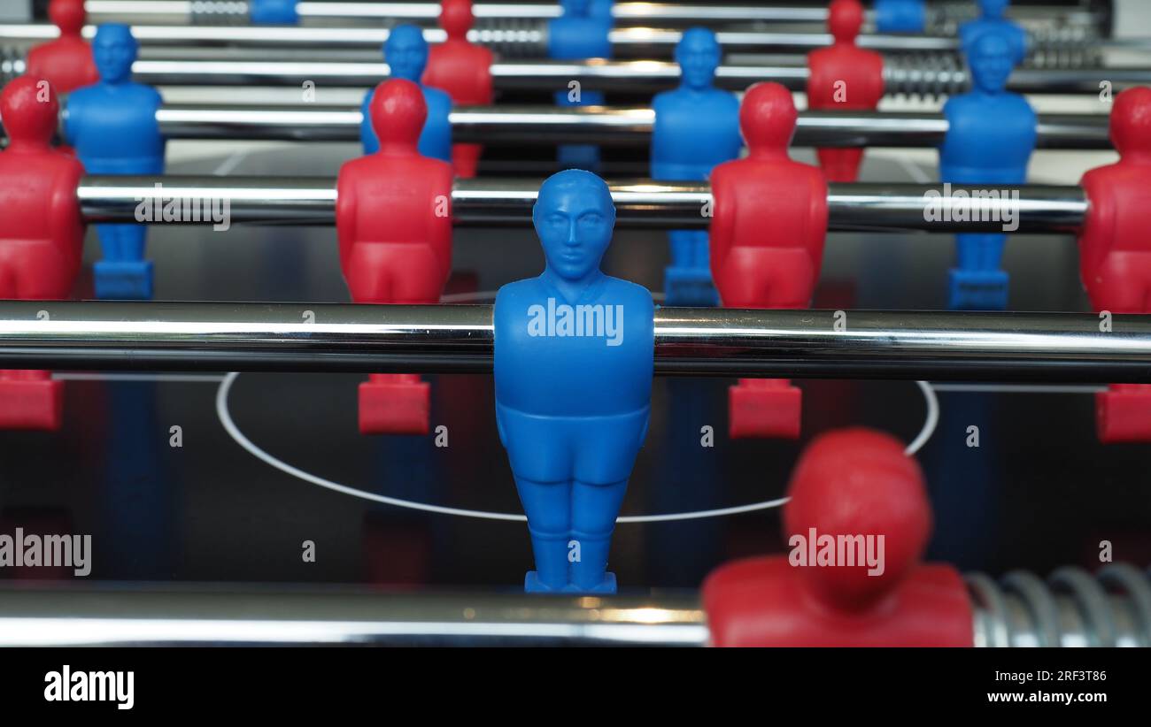 Football table or soccer table game with plastic player figurine. Mini ...