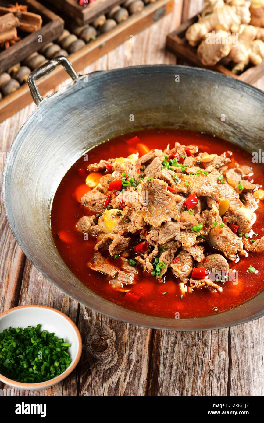 Braised beef in an iron pot Stock Photo - Alamy