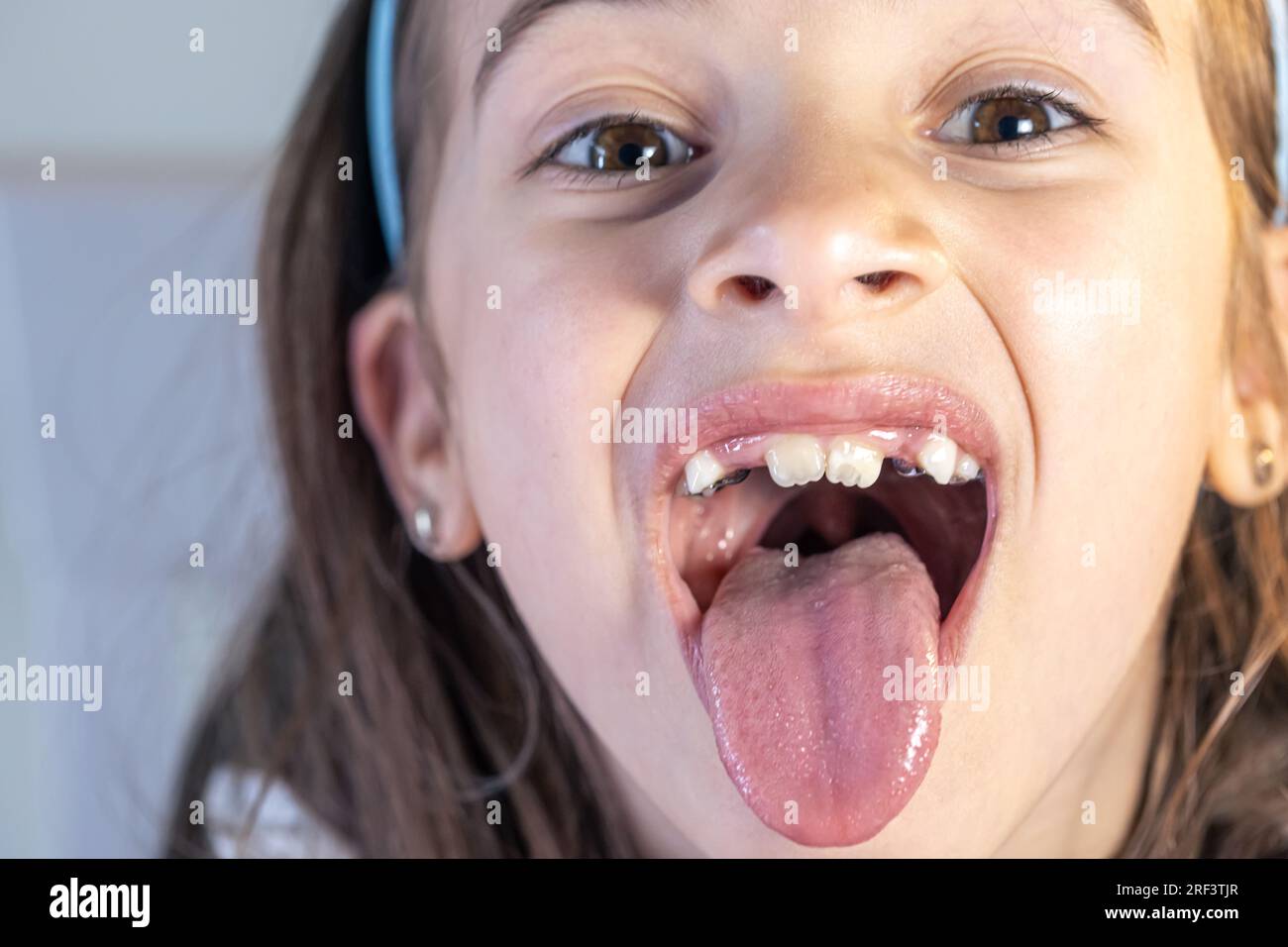 Child during orthodontist visit and oral cavity check-up Stock Photo ...
