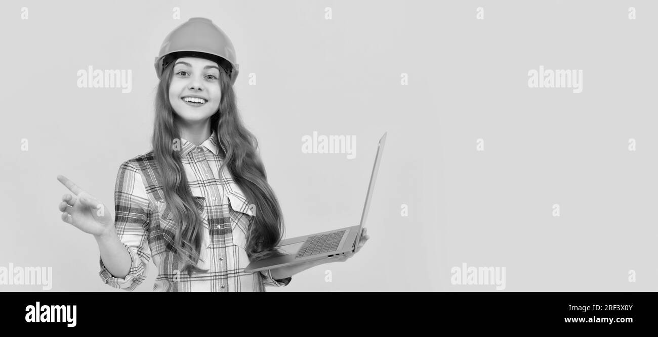 Engineer teenager girl. happy teen girl in helmet and checkered shirt ...