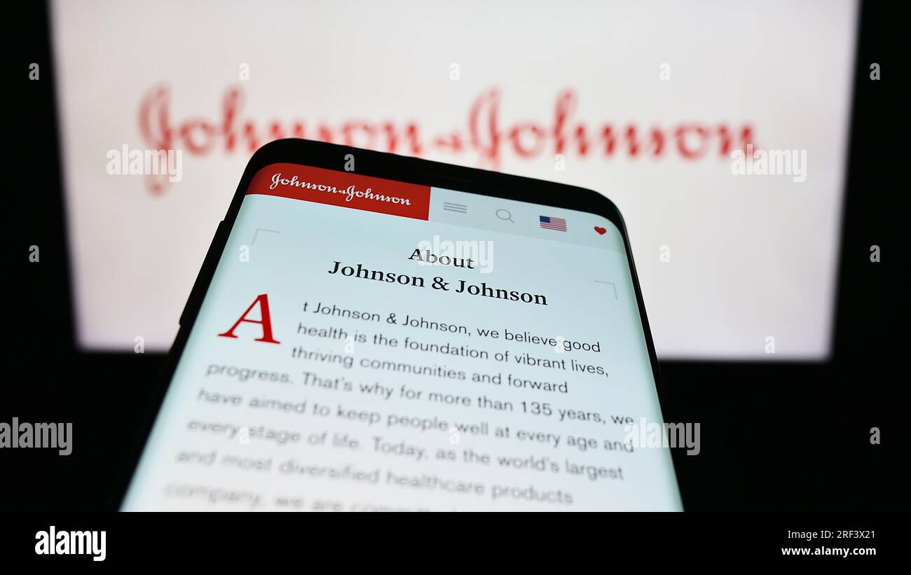 Mobile phone with website of US company Johnson and Johnson (JNJ) on ...