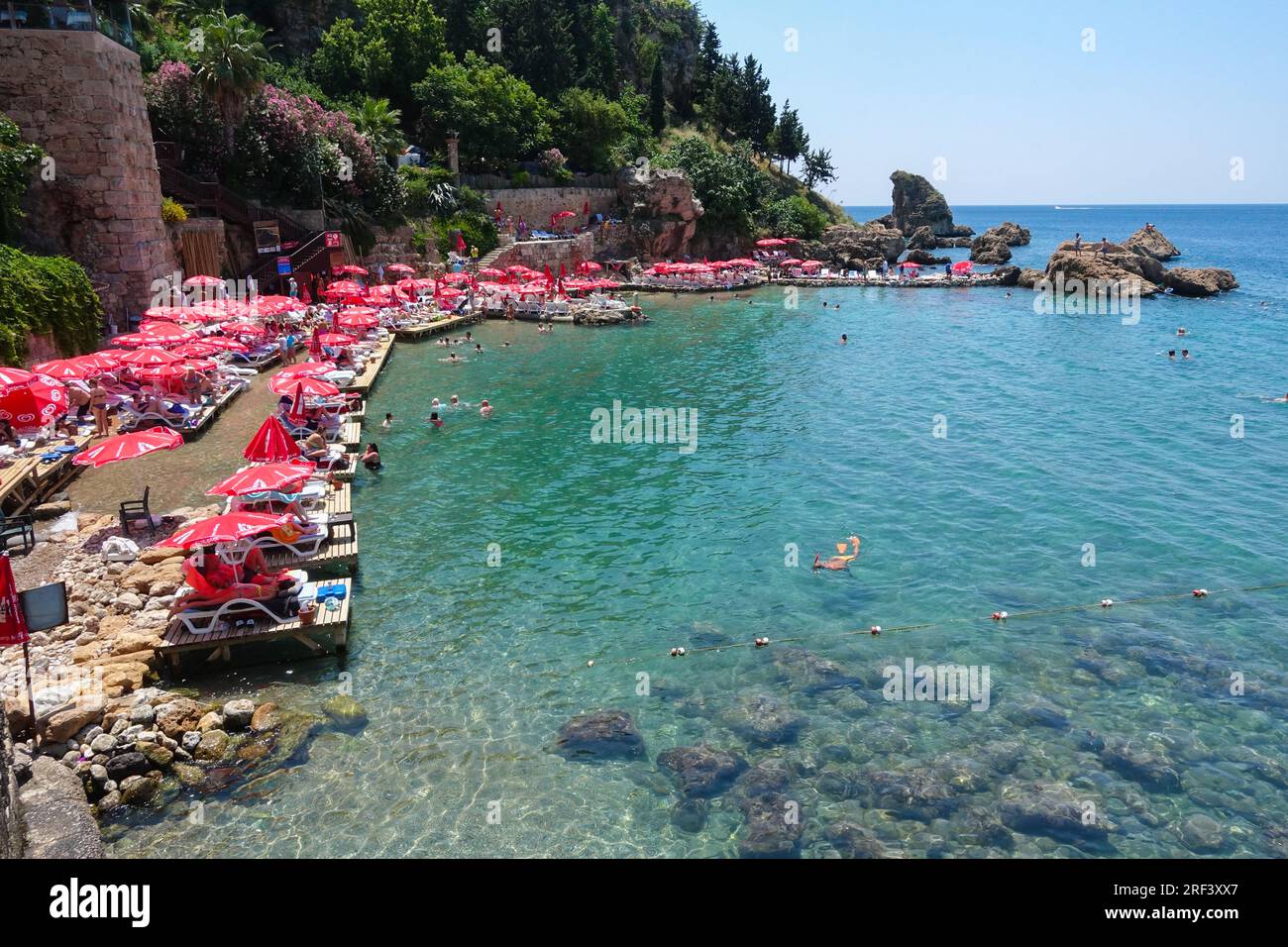 Kaleici beach old town Antalya Turkey with pink sun shade umbrellas ...