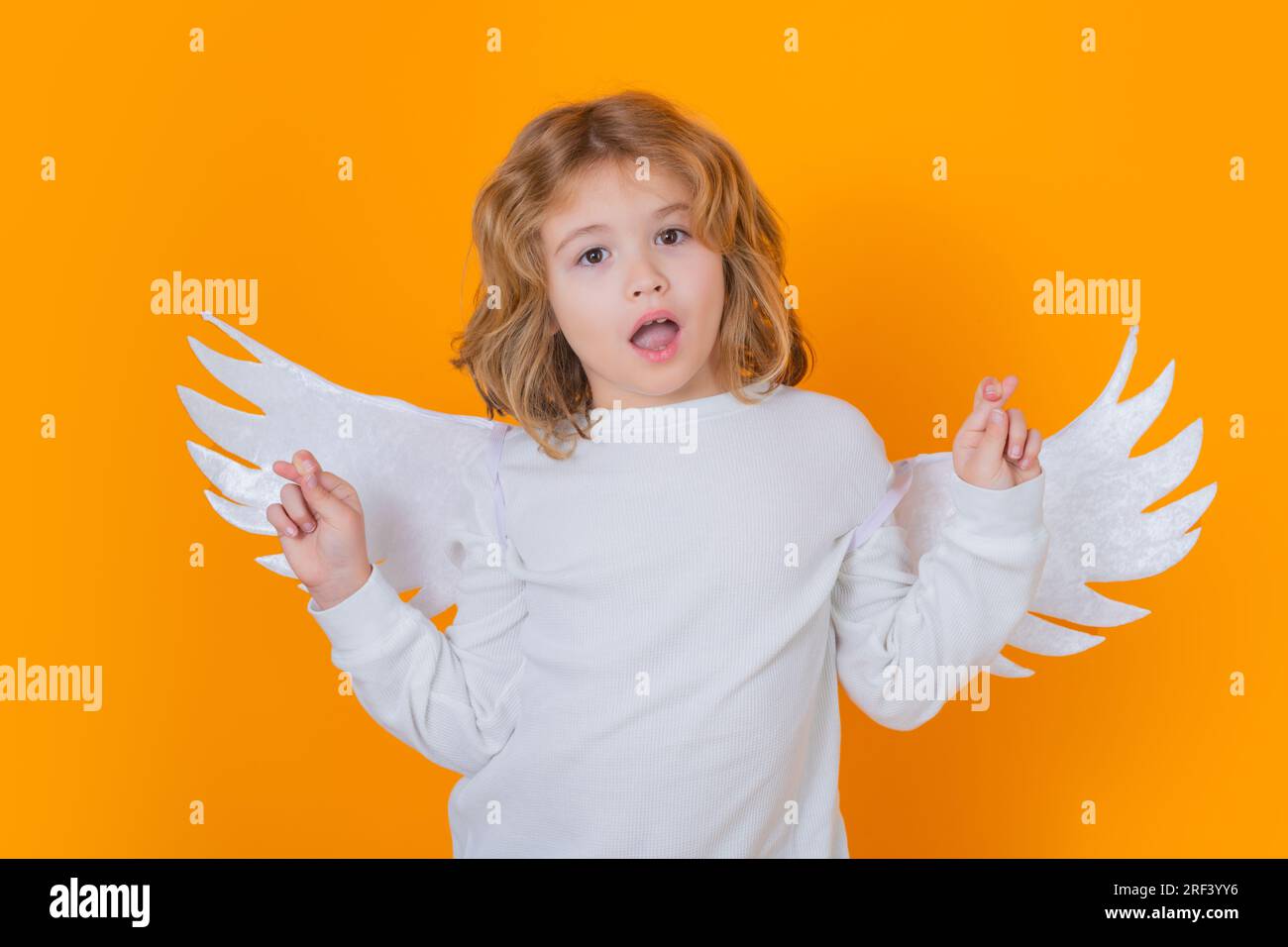Child angel crossed fingers with lucky and hope, good luck. Cute angel ...