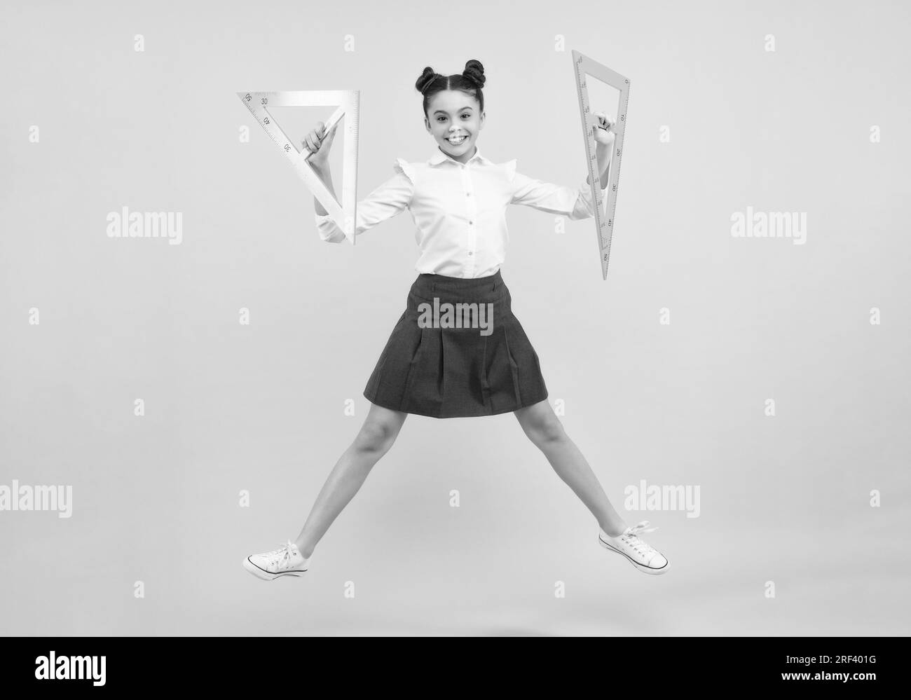 Teenager school girl study math or geometry lesson, measure the size ...