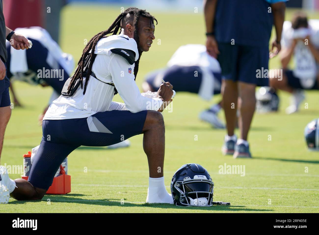 Tennessee Titans wide receiver DeAndre Hopkins stretches during an NFL football training camp ...