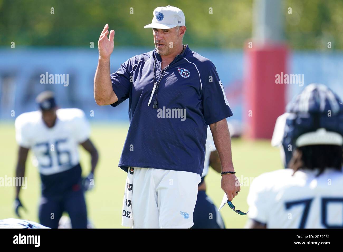 Tennessee Titans head coach Mike Vrabel talks to his players during an ...